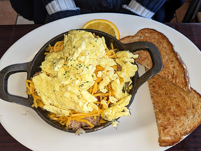 Eggs-cellent choice! This skillet is packed with more goodies than Santa's sleigh. Prepare for a breakfast adventure in every bite.