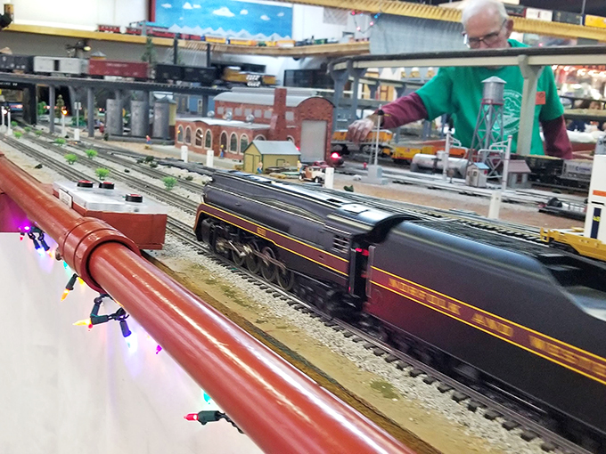 The wizards behind the curtain. These dedicated volunteers keep the tiny trains running on time and the miniature world spinning.