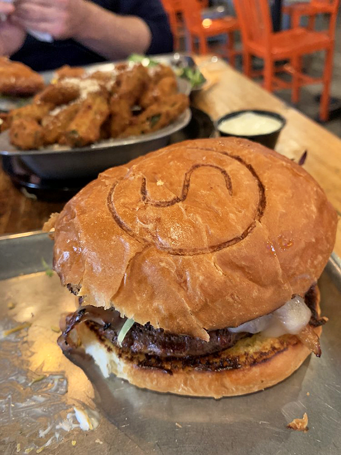 Now that's what I call a proper bacon cheeseburger! It's got more layers than a Shakespeare play, and twice the drama in flavor.