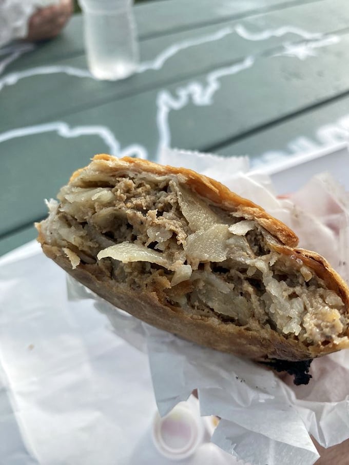 Talk about a beefy situation! This pasty's filling is so generous, it's practically bursting at the seams.