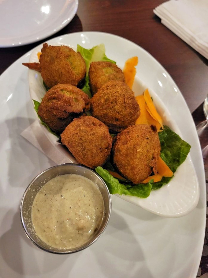 Golden-brown perfection! These falafel balls are like crunchy little flavor grenades waiting to explode in your mouth.