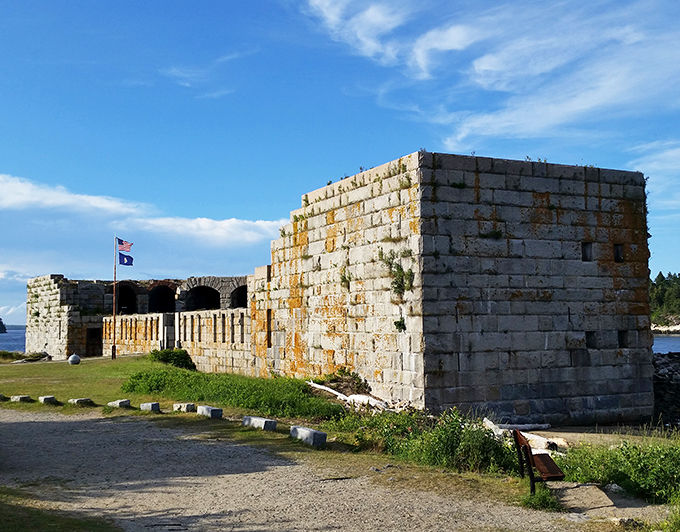 Stars, stripes, and sturdy stones. Fort Popham stands proud, a patriotic sentinel keeping watch over Maine's picturesque coastline.