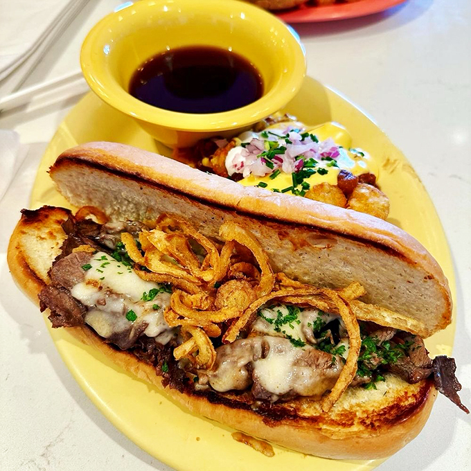 Behold the French Dip &ndash; where beefy deliciousness meets its soulmate in a pool of savory au jus. It's like a flavor hot tub for your taste buds!