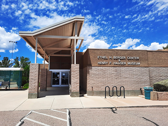 The Henry F. Hauser Museum stands proud, preserving local history behind its distinctive southwestern facade.