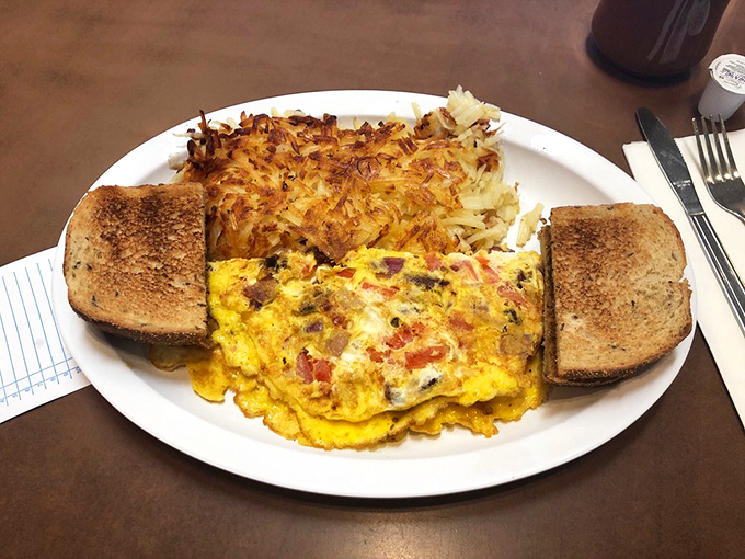 Eggcellent choice! This omelet is packed with more goodies than Santa's sleigh. It's a flavor fiesta wrapped in a golden envelope.