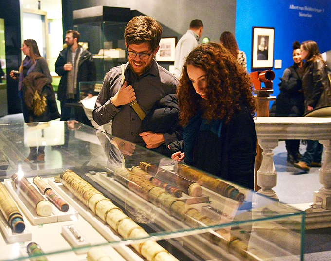 "Is that a meteorite or just a really fancy paperweight?" Visitors ponder the mysteries of the universe and the practicality of space rocks.