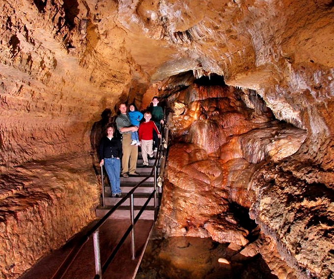 "Watch your step!" takes on a whole new meaning when you're traversing million-year-old rock formations. These intrepid explorers are walking on geological history.