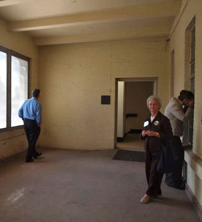 "The reception committee looks a bit stiff." This room's decor screams "mandatory fun time." I've seen livelier crowds at DMV waiting rooms!