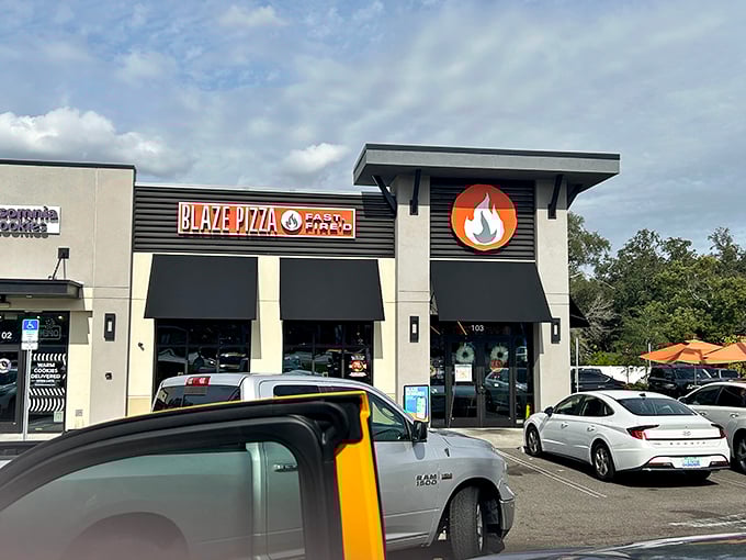 Pizza assembly line meets flavor explosion. Blaze is like Willy Wonka's factory, but for pizza lovers.