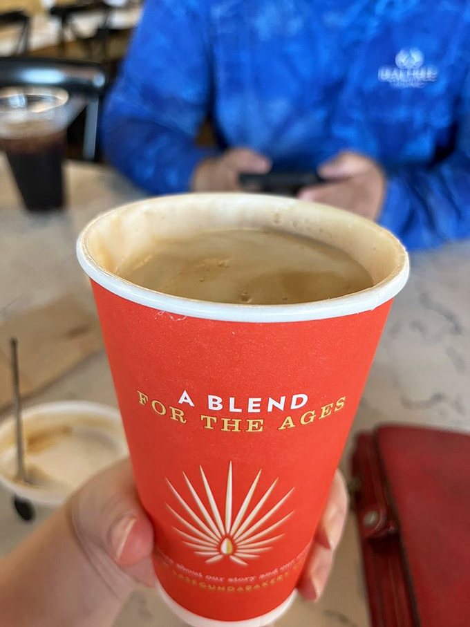 "A blend for the ages" isn't just clever marketing – it's a promise in a cup. This cappuccino looks ready to time-travel your taste buds to caffeinated bliss.