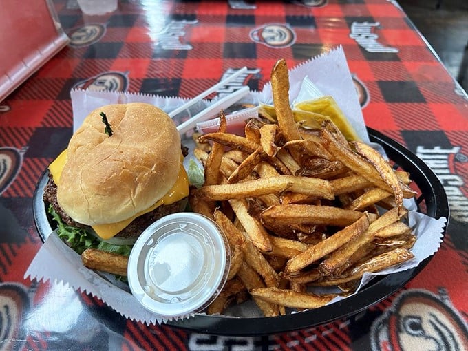 Cheese Louise! This burger's melty goodness is the stuff dreams are made of. The fries? They're not playing second fiddle &ndash; they're the whole orchestra.