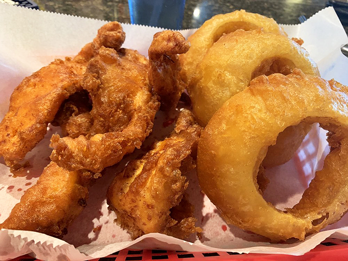 Crispy critters! These chicken tenders and onion rings are the dynamic duo of comfort food, here to save you from boring meals and sad taste buds.