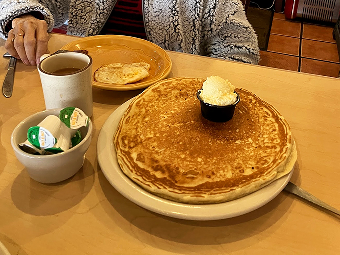 Pancakes so big, they need their own area code. With a dollop of butter that's basically saying, "Go big or go home!"