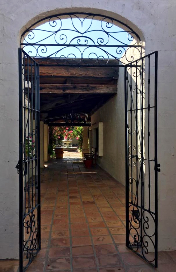 Portal to the past or pathway to lunch? This inviting archway promises adventures in both history and hunger-busting.