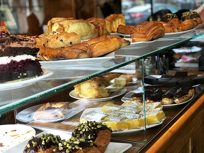 Pastry paradise! A display case so tempting, it should come with a warning label: "May cause involuntary drooling."