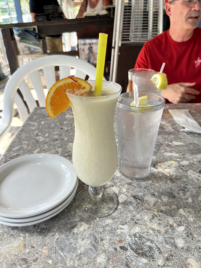 Vacation in a glass! This Pi&ntilde;a Colada is like a liquid postcard from paradise, complete with a miniature umbrella for your imaginary beach getaway.
