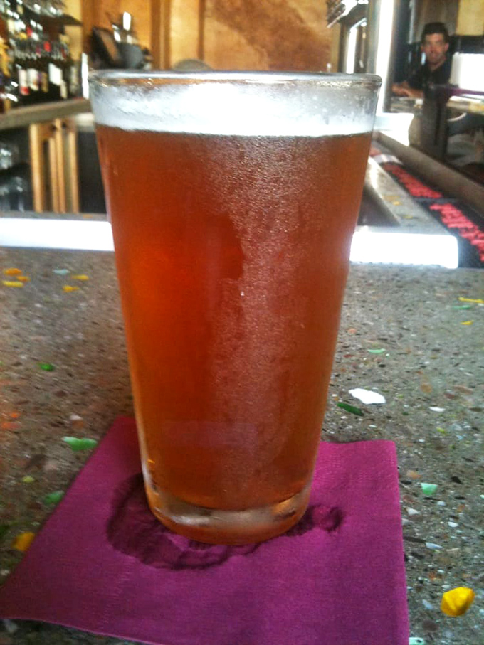 Amber nectar in a glass &ndash; this local brew is the perfect pizza wingman. Cheers to good taste!