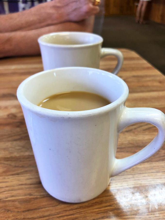 The elixir of life, diner-style. This cup of joe promises to turn any Grumpy Cat into a morning person.