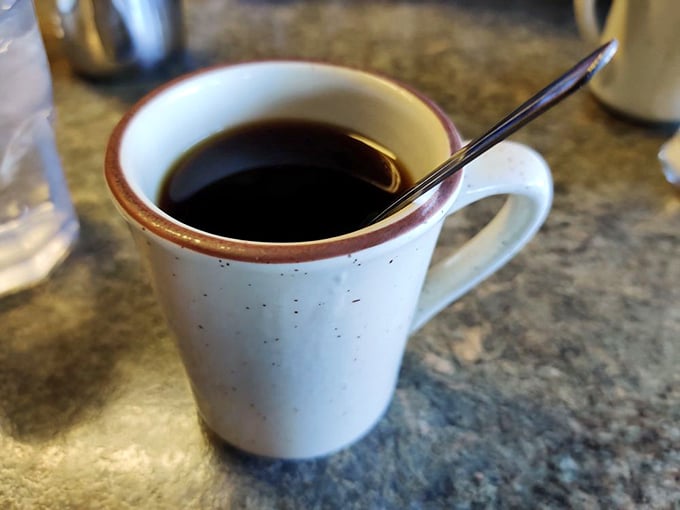 The elixir of life, diner-style. This no-nonsense cup of joe promises to kickstart your day faster than you can say "refill, please!"