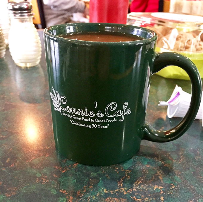 Connie's coffee mug: where liquid motivation meets Midwest hospitality. One sip and you'll be ready to take on the world (or at least the rest of your breakfast).