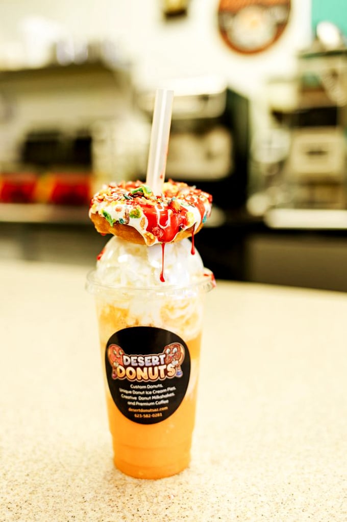 Donuts gone wild! This shake topped with a full-sized donut is what happens when dessert has an identity crisis.