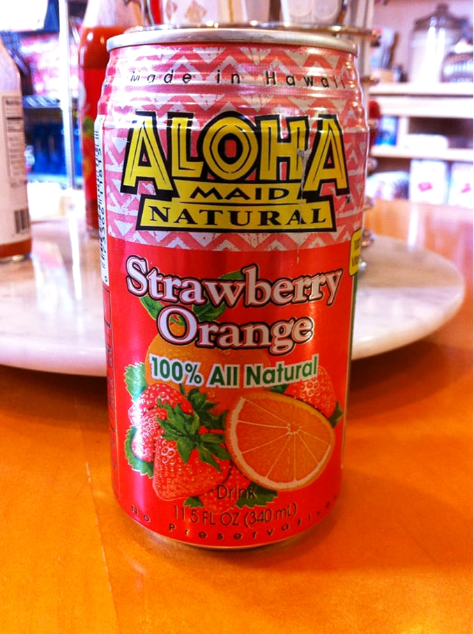 Sip on sunshine with this Aloha Maid juice. It's like a Hawaiian vacation in a can, minus the sunburn and sand in your shorts.