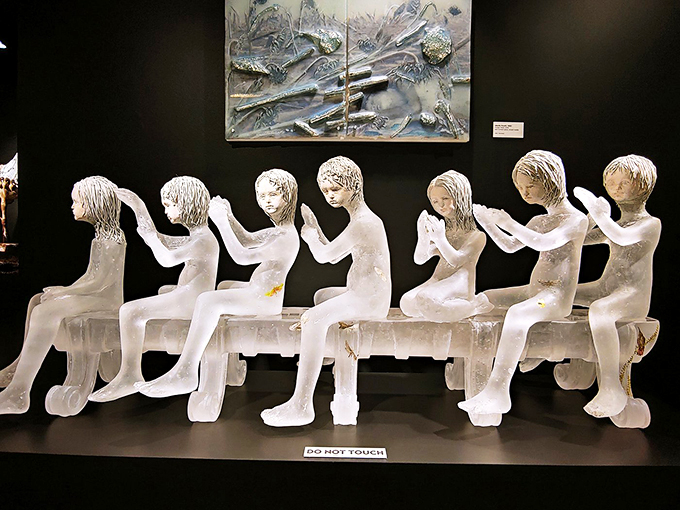 The ultimate game of musical chairs! These glass figures look like they're playing a very fragile version of 'Duck, Duck, Goose.'