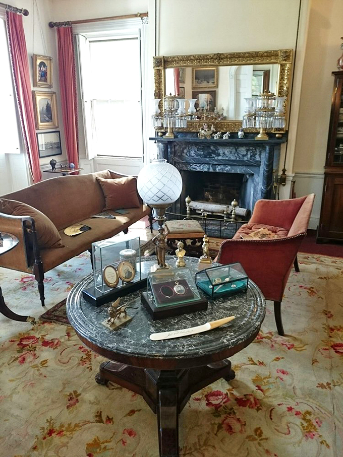 "Mad Men" meets "Downton Abbey" in this living room that's seen more drama than a soap opera marathon. Can't you just smell the whiskey and secrets?