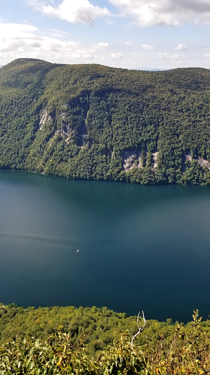 Cliffs that could give vertigo to an eagle. Lake Willoughby's dramatic shoreline is Mother Nature's masterpiece in progress.