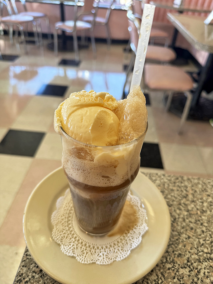 Float on! This root beer float isn't just a drink; it's a time machine in a glass, transporting you back to simpler, fizzier times.
