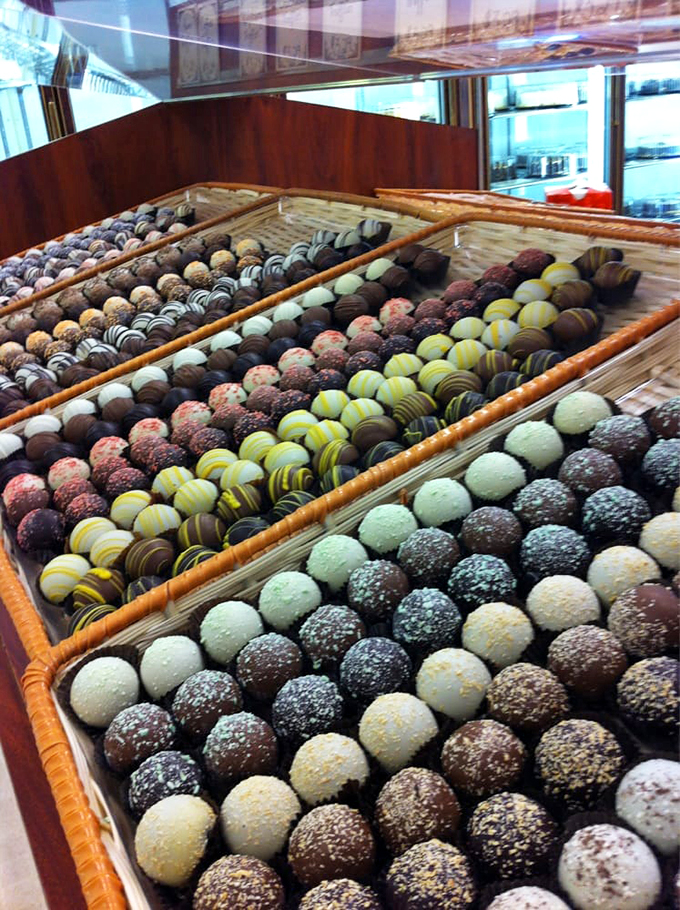 Chocolate truffles that would make Willy Wonka weep with joy. Each one is a tiny globe of happiness, waiting to melt your troubles away.