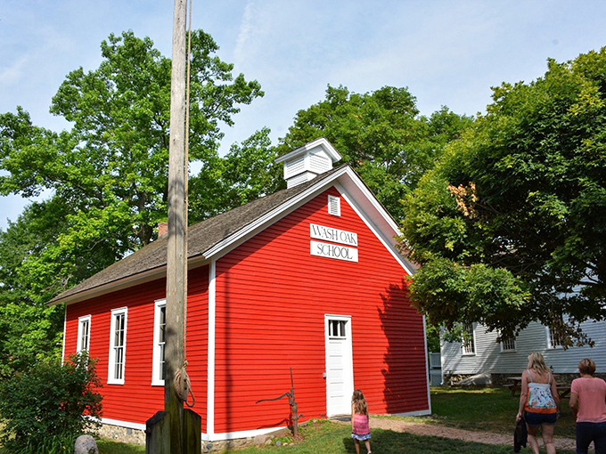 School's in session! This cherry-red schoolhouse is giving major "Little House on the Prairie" vibes. No iPads allowed &ndash; slate tablets only!