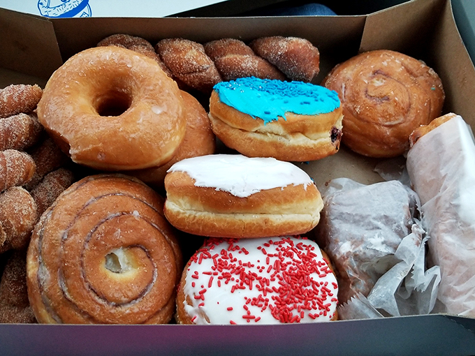 A box of joy, served with a side of whimsy. From classic glazed to wild blue-frosted creations, there's a donut here to satisfy every craving.