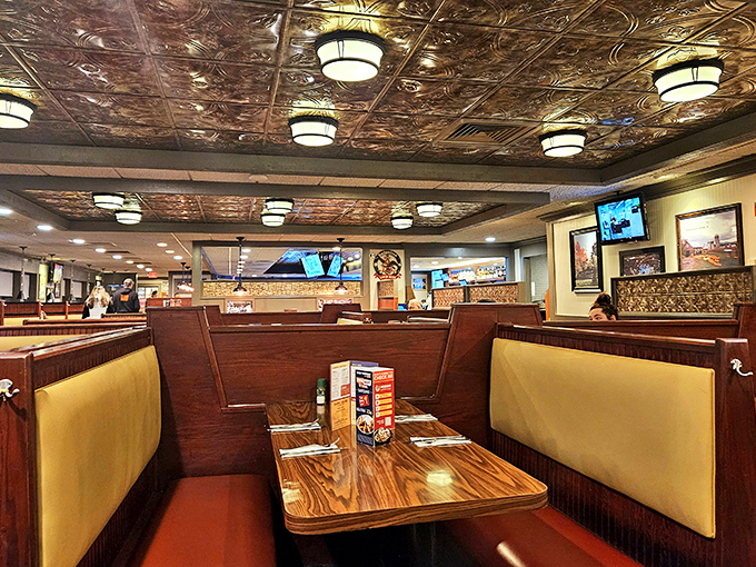 Cozy booths and warm lighting &ndash; it's like your grandma's kitchen got a swanky makeover.