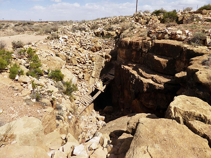 The infamous cave entrance beckons brave souls. Even in daylight, there's something undeniably spine-tingling about this portal.