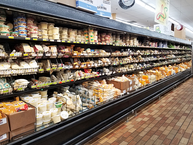 Holy cheese wheels, Batman! This dairy paradise would make even Wallace and Gromit weak at the knees. From mild to wild, there's a cheese here for every palate and pizza.