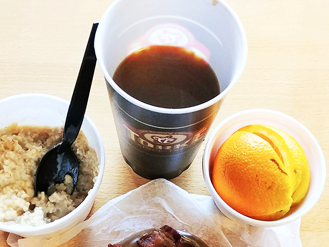 The breakfast trifecta: coffee, oatmeal, and&hellip; is that an orange? Kudos for sneaking in some Vitamin C between indulgences!