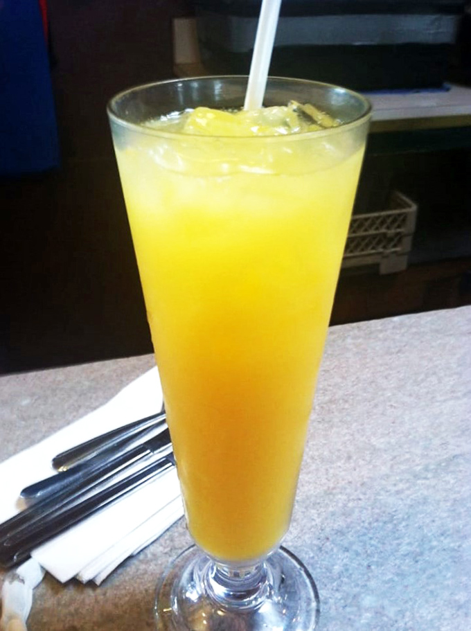 Sunshine in a glass! This vibrant orange juice is so fresh, it might just start tap dancing on your taste buds like a citrusy Fred Astaire.