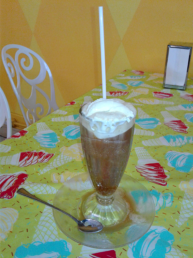 Shake it up, baby! This frosty concoction is like a party in a glass, complete with a whipped cream hat and a straw for easy sipping.