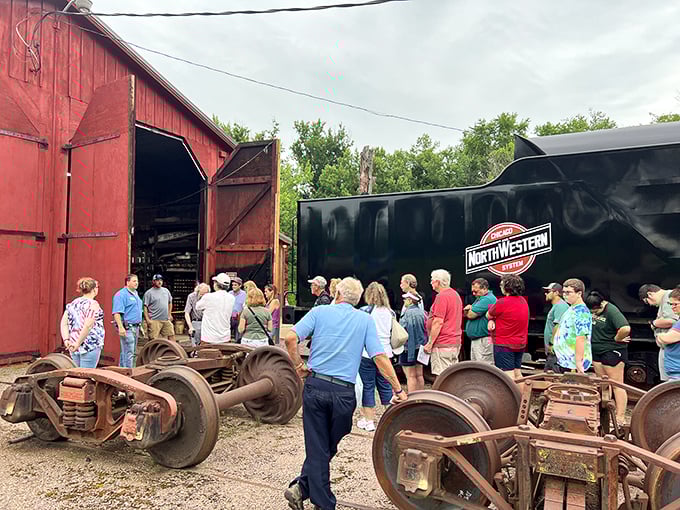 Hands-on history lesson in progress. These visitors are getting a real taste of life on the rails &ndash; no textbooks required!