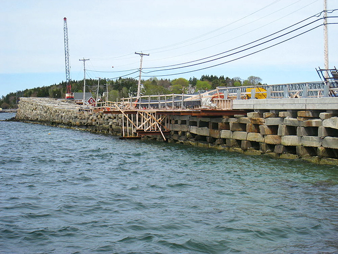 Who needs solid ground? This unique cribstone bridge lets the tide flow through, offering a truly immersive coastal experience.