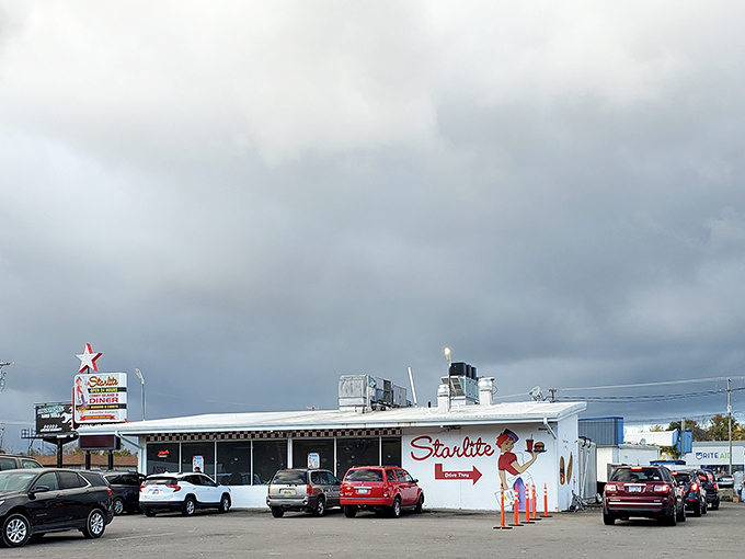 Cruise into the past! This vintage vision is the perfect place to park your wheels and indulge in some timeless treats.