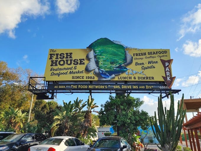 The Fish House sign: Dive into deliciousness at The Fish House. Their sign is just the beginning of a fin-tastic culinary journey!