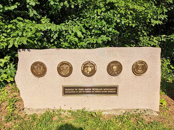 A salute to service, immortalized in concrete. These badges remind us that heroes come in all forms &ndash; even as statues in a quirky roadside attraction.