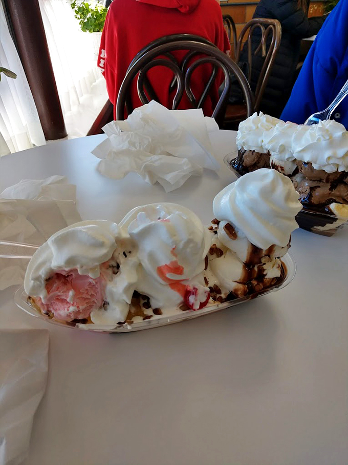 Behold, the Banana Split Supreme! It's not just a dessert, it's a work of art that belongs in the Louvre... of your stomach.