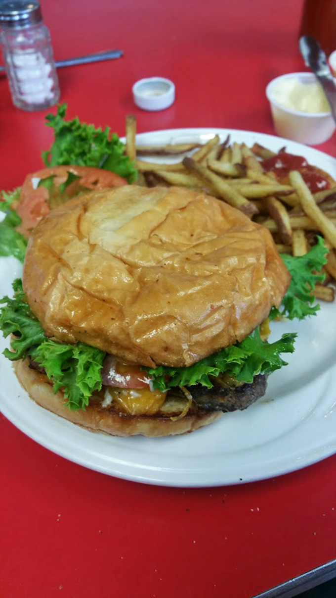 Now that's what I call a burger! It's not just a meal, it's a delicious skyscraper of beefy goodness.