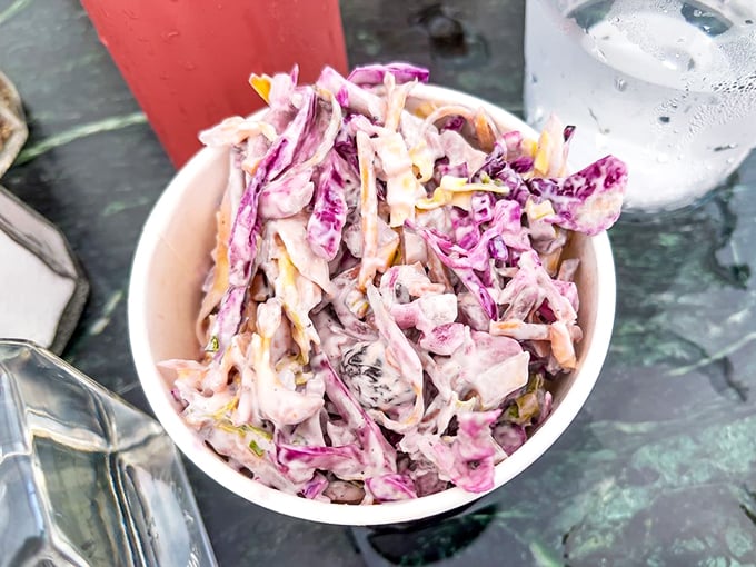 Coleslaw that's anything but ordinary. This vibrant side dish is like a party in a bowl - crunchy, creamy, and ready to dance with your taste buds.