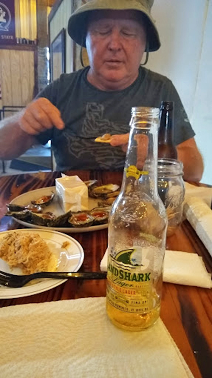 A feast fit for Poseidon himself! This spread of oysters and sides is making waves in the flavor department.