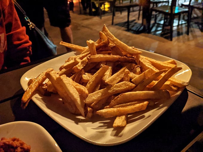 Fries, glorious fries! Golden, crispy, and piled high – these spuds are the unsung heroes of any Kuma's meal.