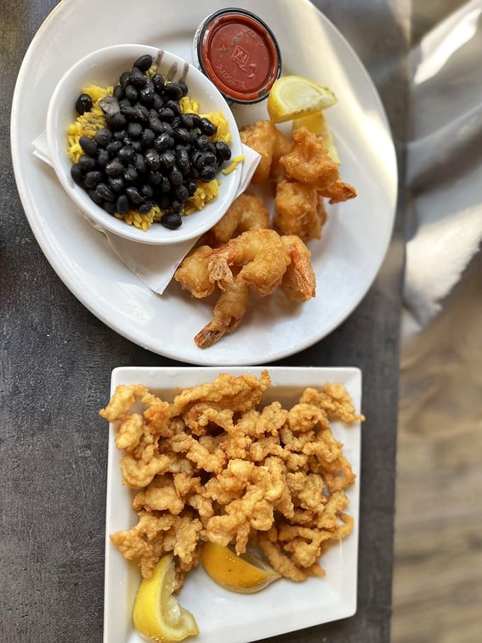 Fried shrimp and clam strips: the dynamic duo of seafood snacking. These crispy crustaceans and mollusks are so good, you'll want to high-five the chef.